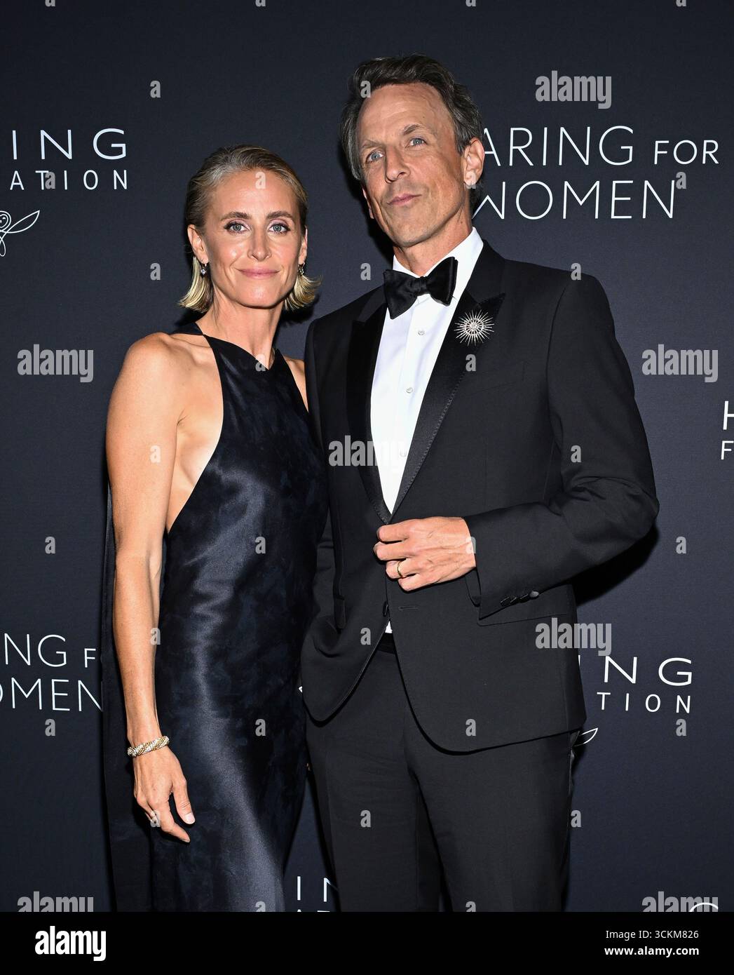 Alexi Ashe, left, and Seth Meyers attend the Kering Caring for Women ...