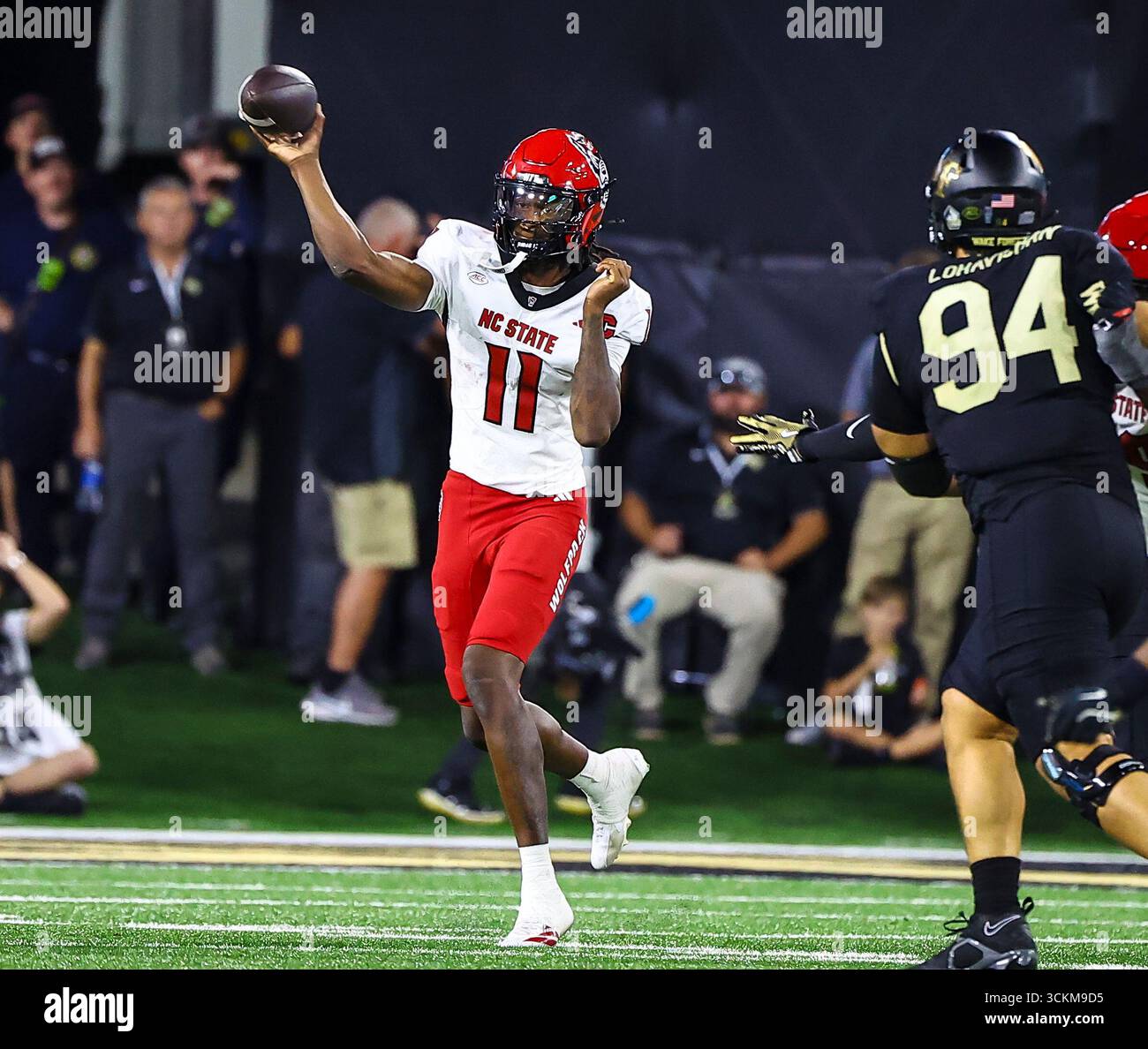 September 11,2025: NC State quarterback CJ Bailey (11) passes the ball ...