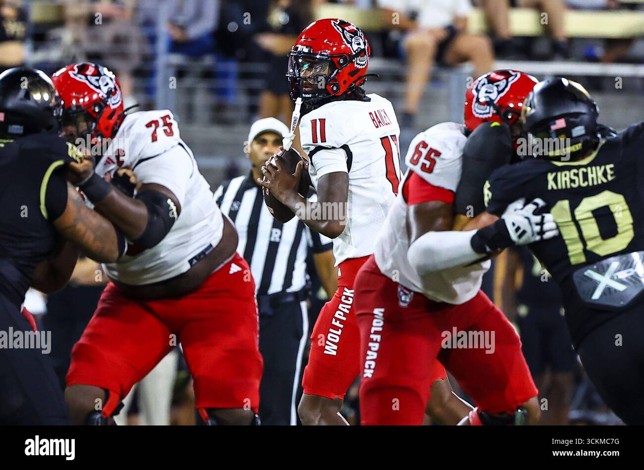 September 11,2025: NC State quarterback CJ Bailey (11) looks for open ...
