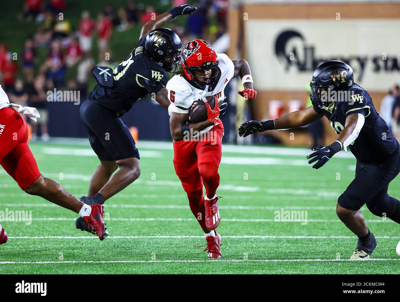 September 11,2025: NC State wide receiver Wesley Grimes (6) runs past ...