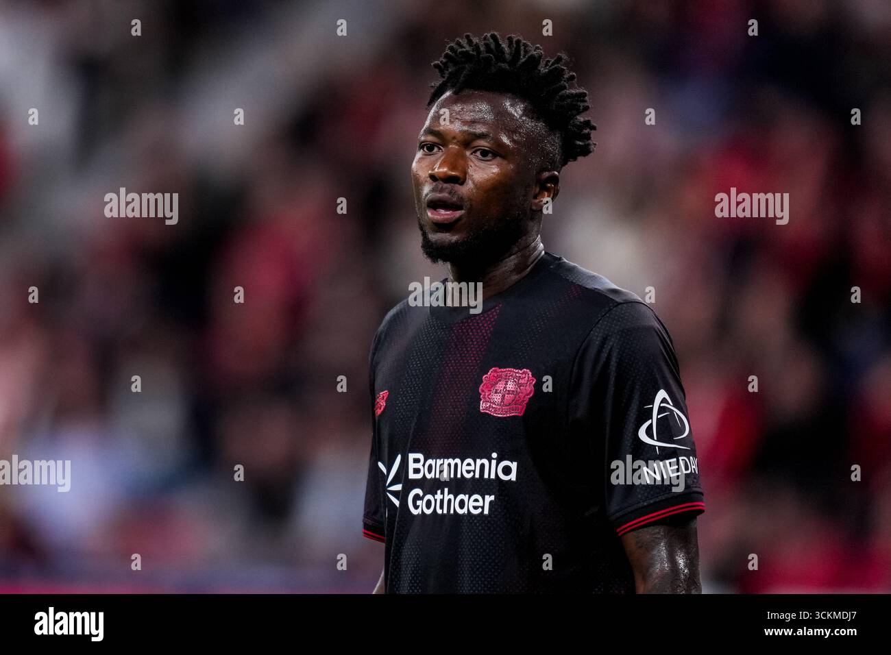 LEVERKUSEN, GERMANY - SEPTEMBER 12: Edmond Tapsoba of Bayer 04 ...