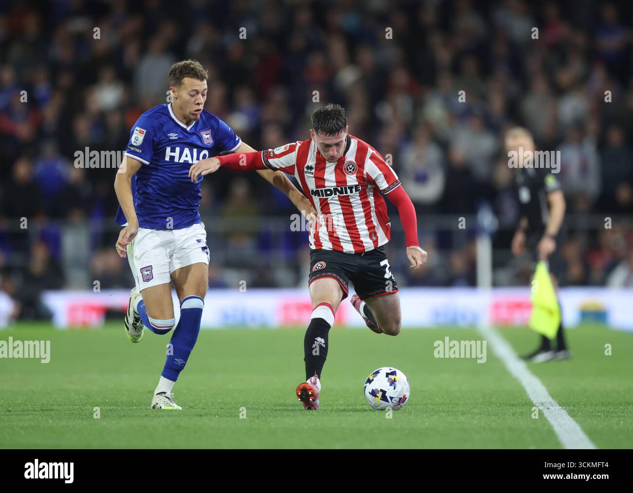 Ipswich, England, 12th September 2025. Jacob Greaves of Ipswich Town (l ...