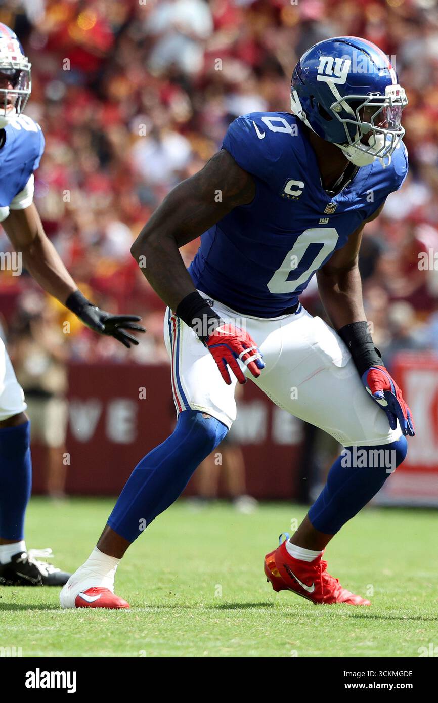 New York Giants linebacker Brian Burns (0) rushes during an NFL ...
