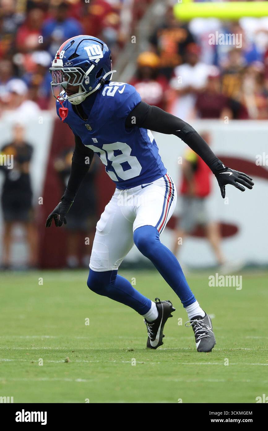 New York Giants cornerback Cor'Dale Flott (28) rushes during an NFL ...