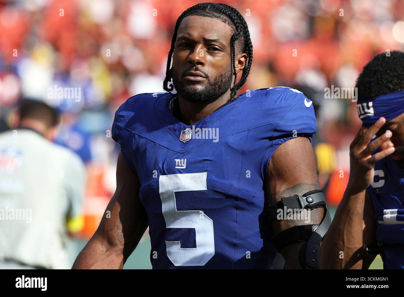 New York Giants linebacker Kayvon Thibodeaux (5) looks on after an NFL ...