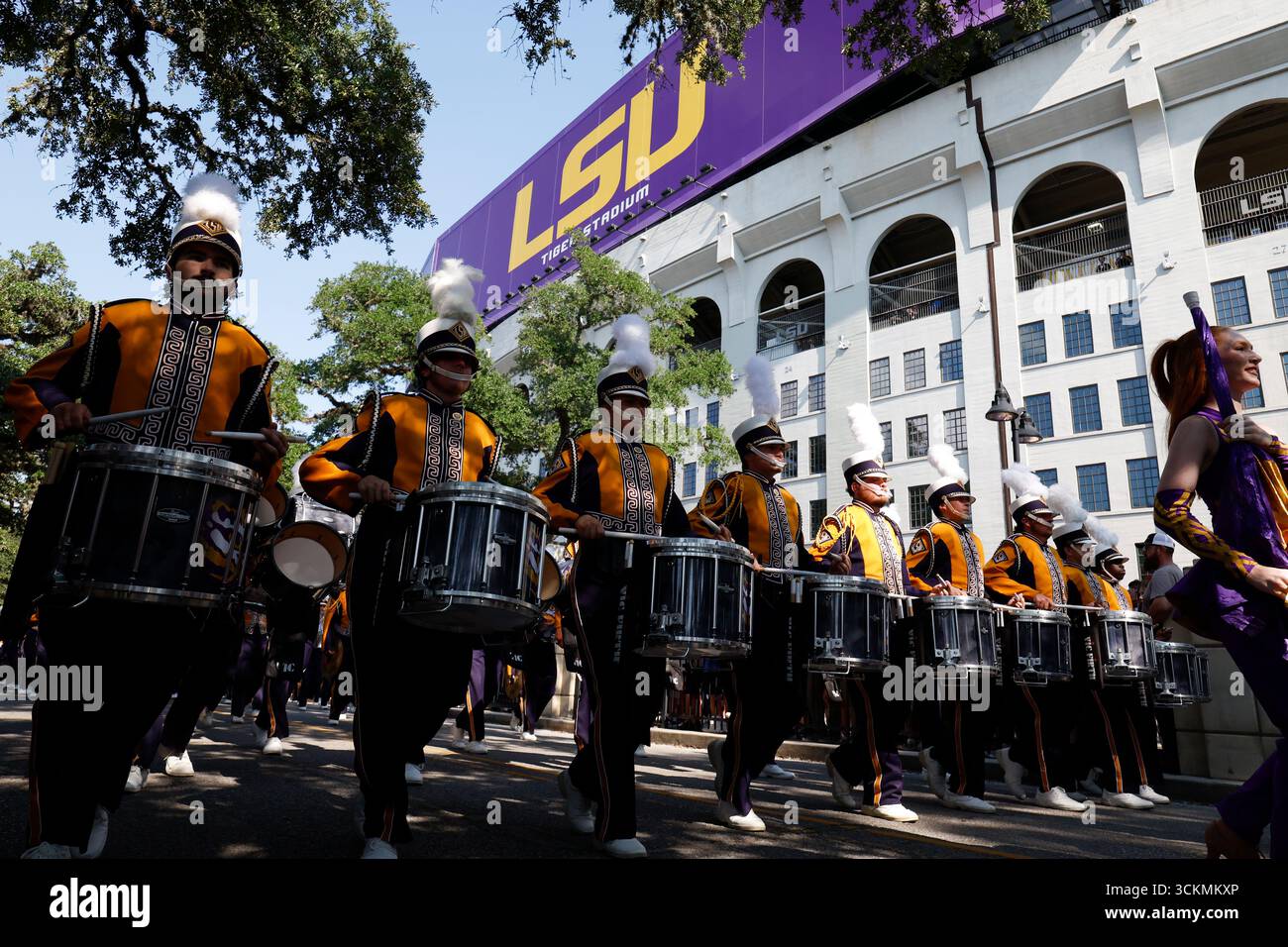 LSU marching band walks down victory hill outside Tiger stadium before ...