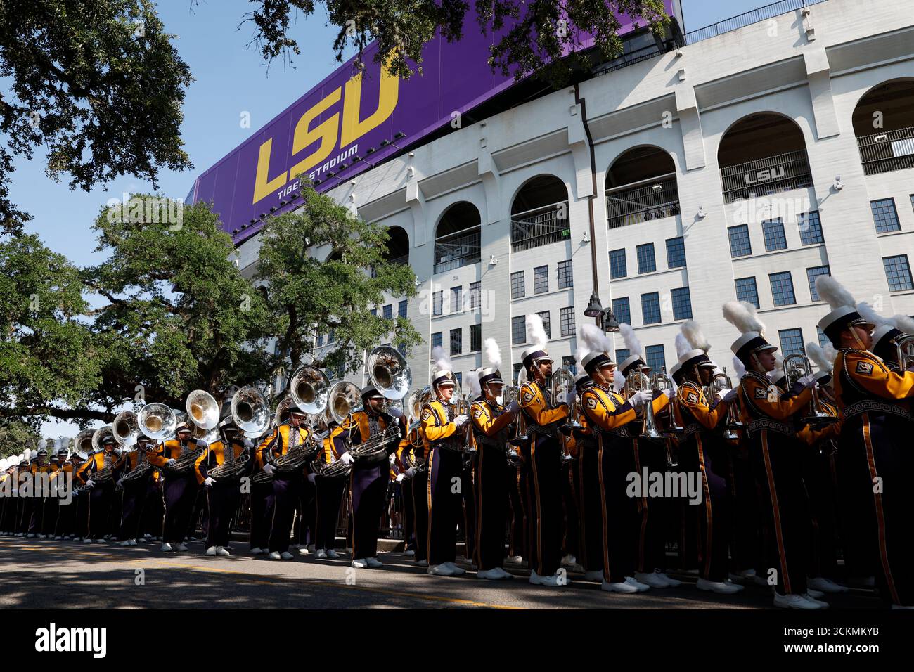 LSU marching band walks down victory hill outside Tiger stadium before ...