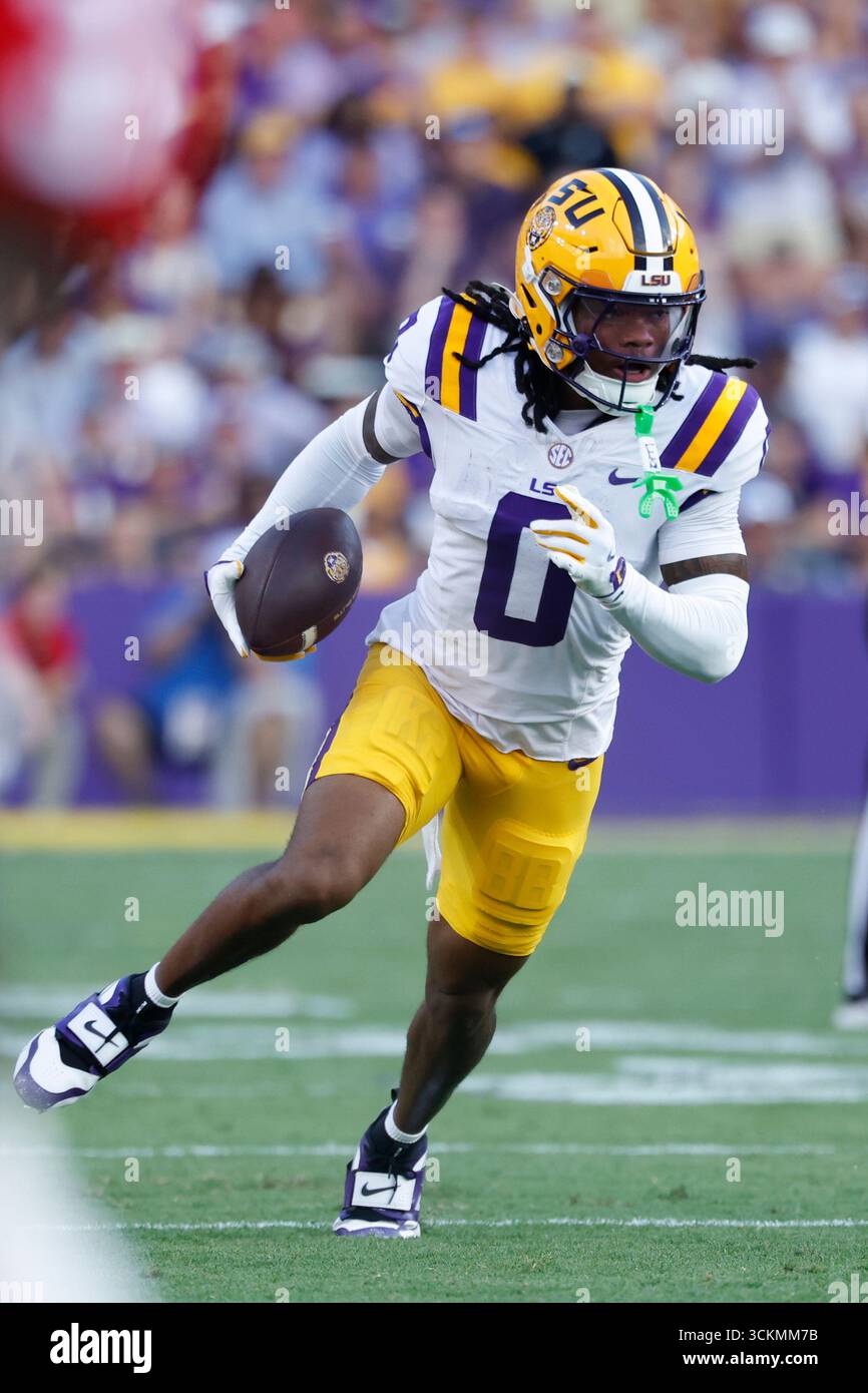 LSU wide receiver Zavion Thomas (0) carries the ball during an NCAA ...