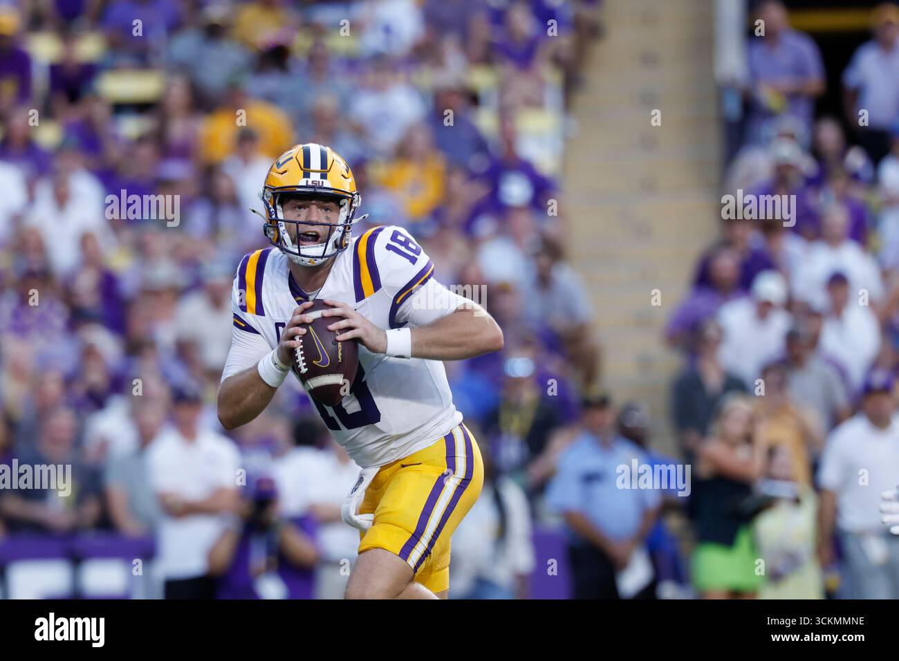 LSU quarterback Garrett Nussmeier (18) carries the ball as he looks to ...