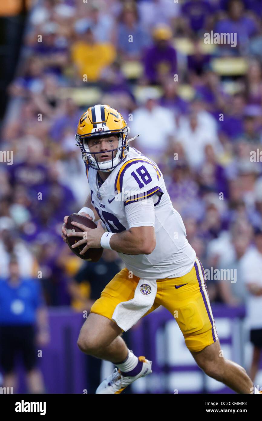 LSU quarterback Garrett Nussmeier (18) carries the ball as he looks to ...