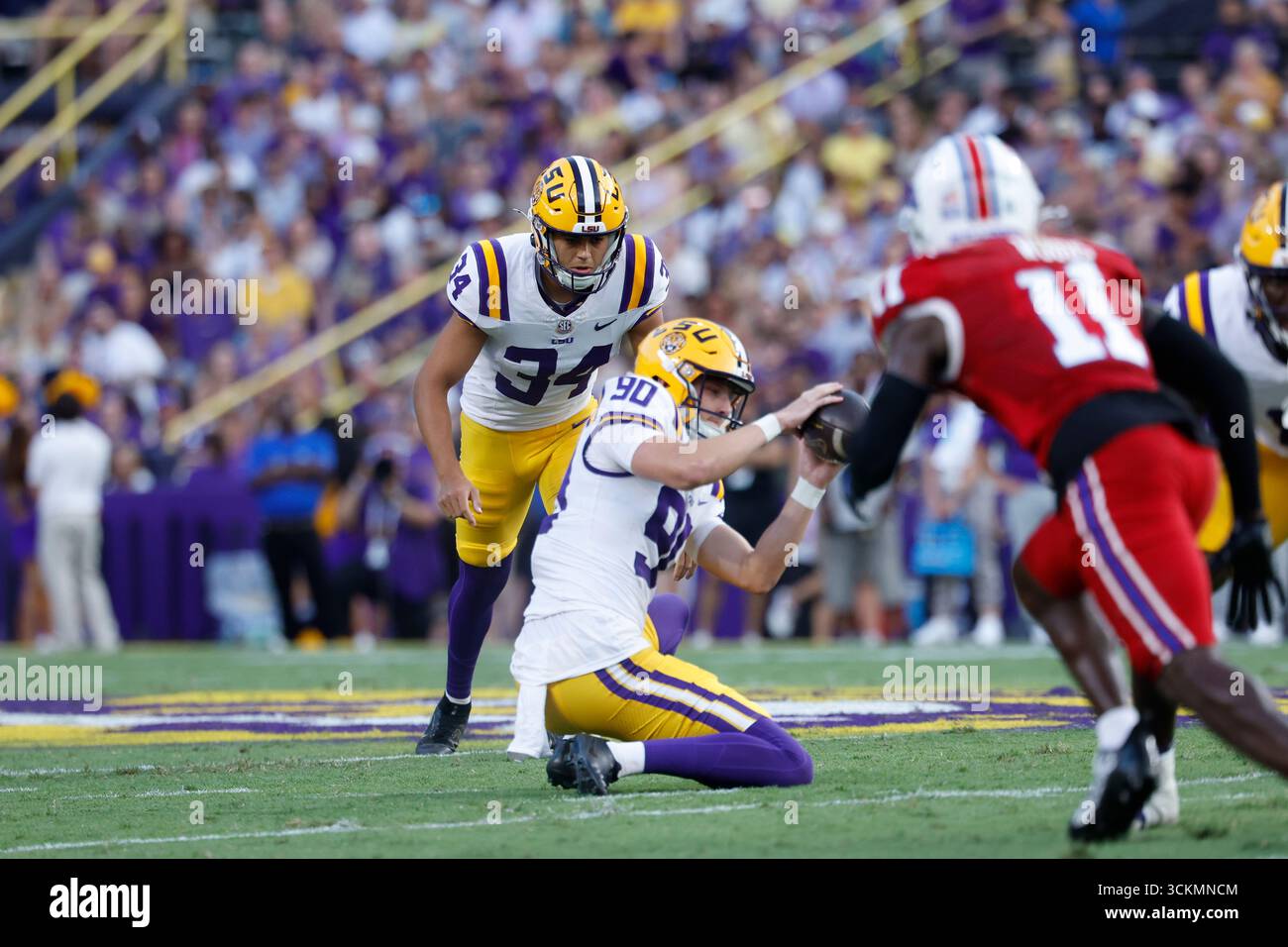 LSU kicker Damian Ramos (34) looks to kick a field goal during an NCAA ...