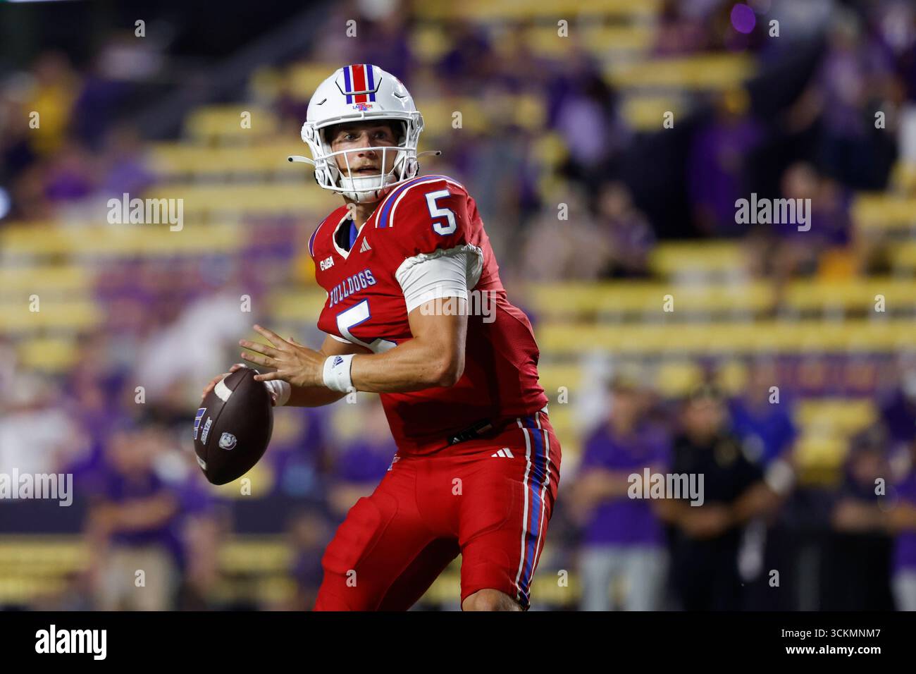 Louisiana Tech quarterback Blake Baker (5) looks to pass during an NCAA ...