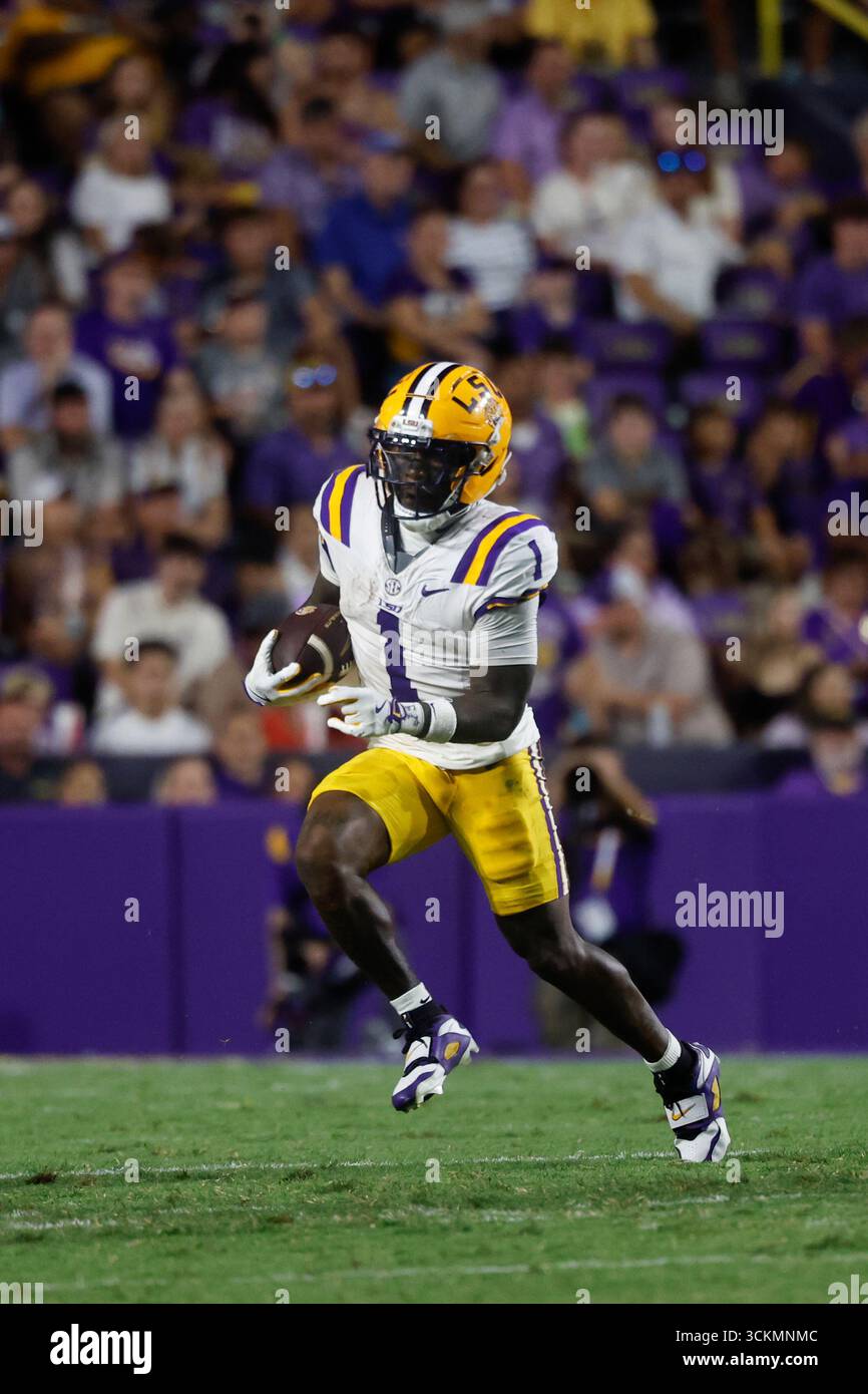 LSU wide receiver Aaron Anderson (1) carries the ball during an NCAA ...