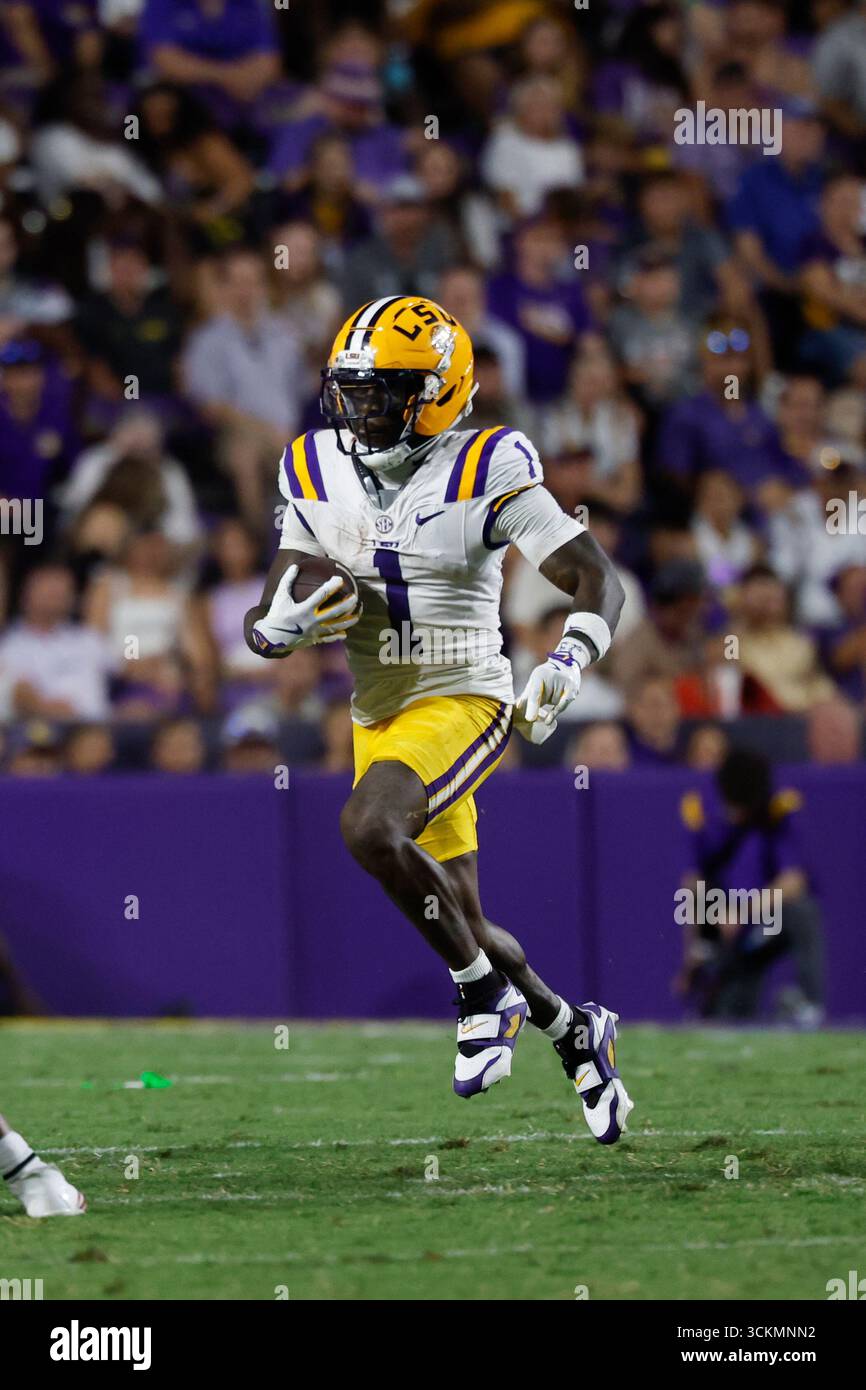 LSU wide receiver Aaron Anderson (1) carries the ball during an NCAA ...