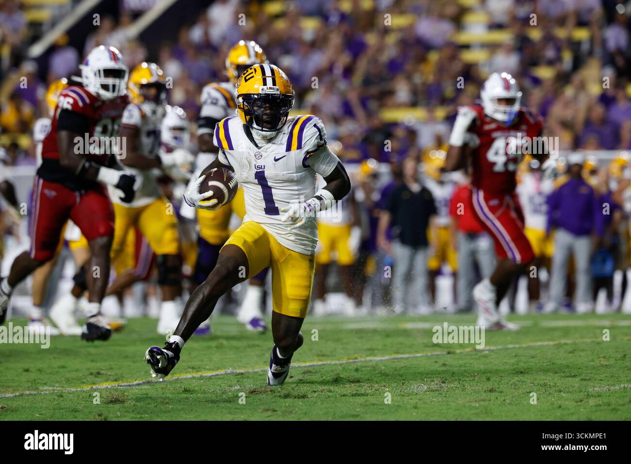LSU wide receiver Aaron Anderson (1) carries the ball during an NCAA ...