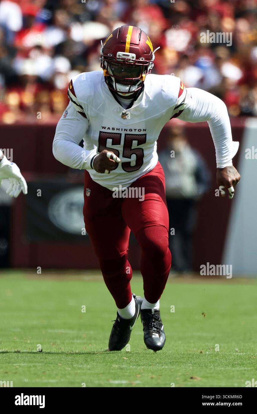 Washington Commanders defensive end Jacob Martin (55) rushes during an ...