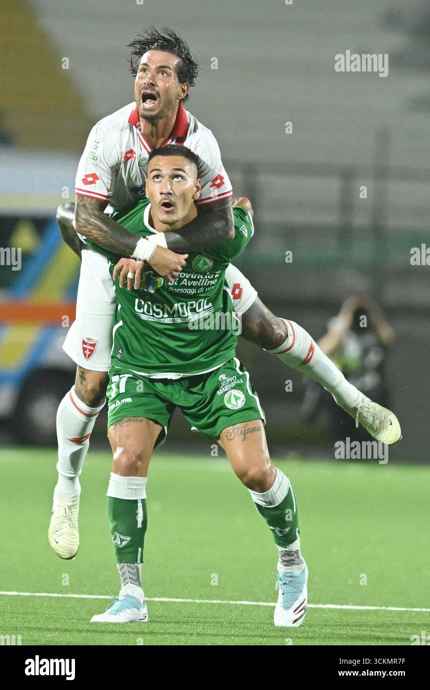 Armando Izzo of AC Monza competes for the ball with Luca D'Andrea of US ...