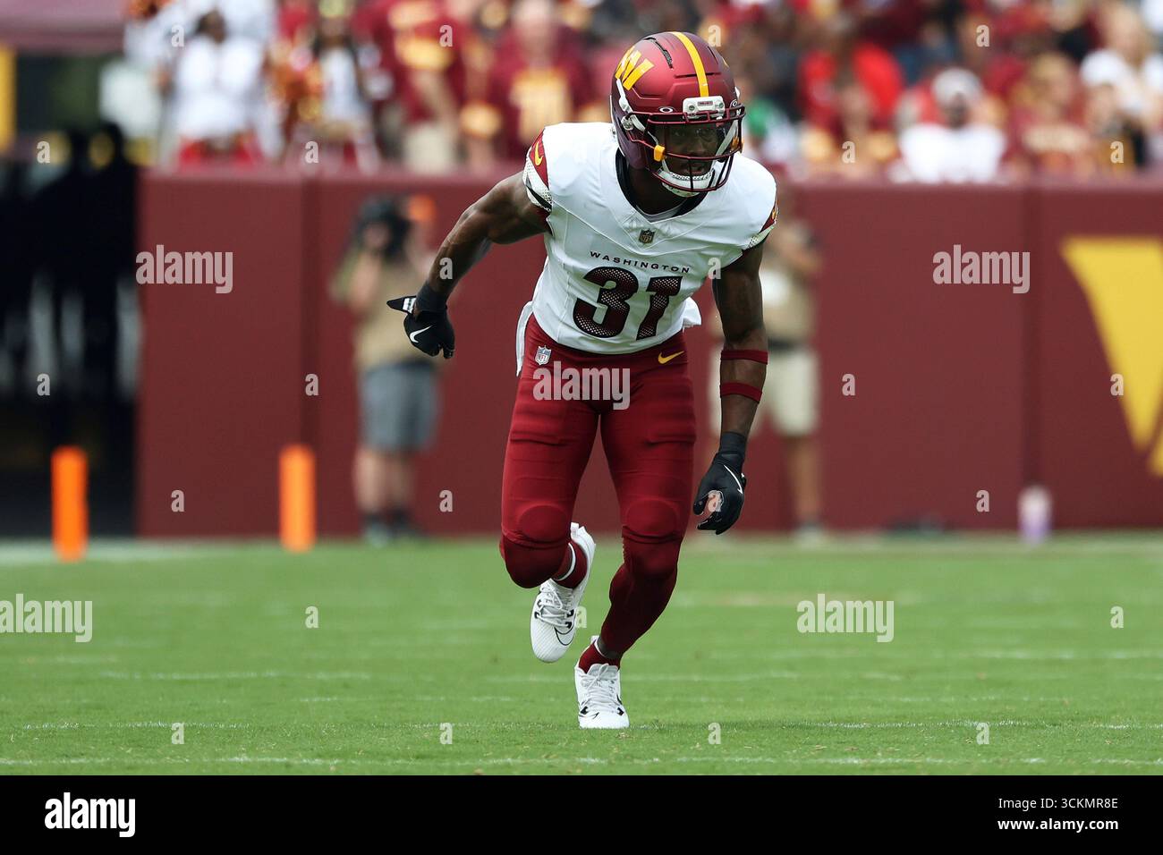 Washington Commanders cornerback Jonathan Jones (31) rushes during an ...