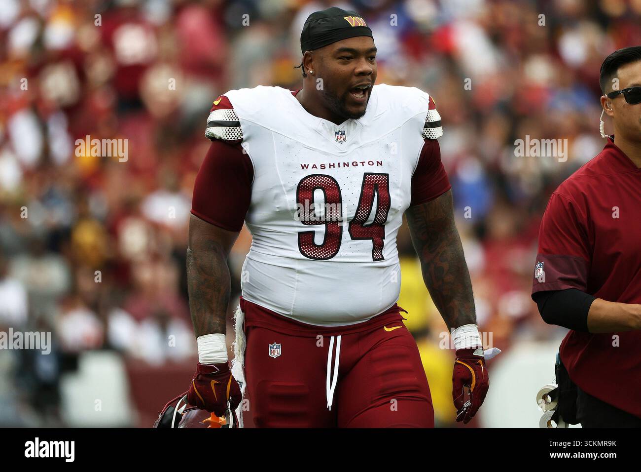 Washington Commanders defensive tackle Daron Payne (94) looks on during ...