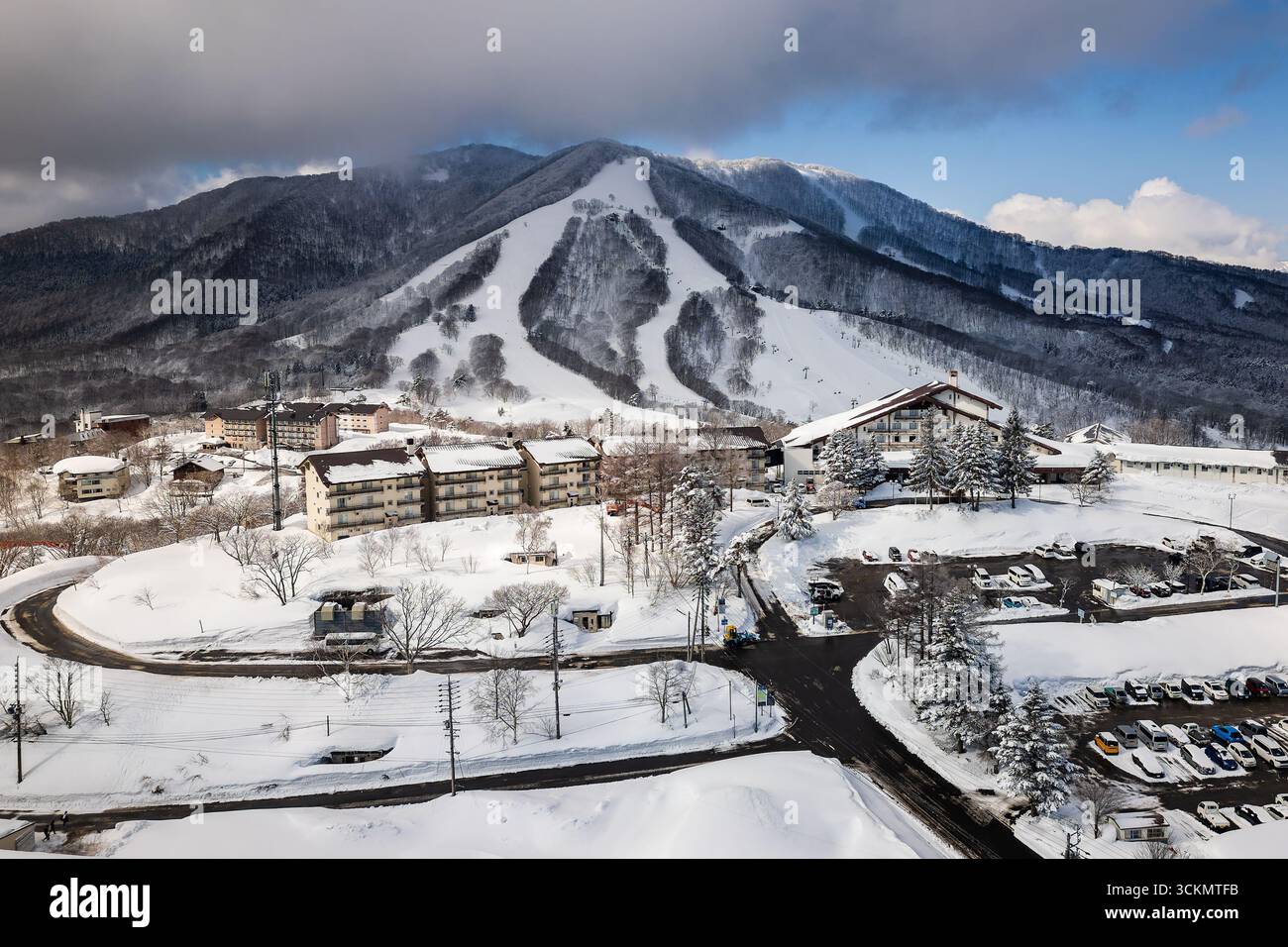 Aerial drone view of Madarao ski resort village and mountain slopes in ...
