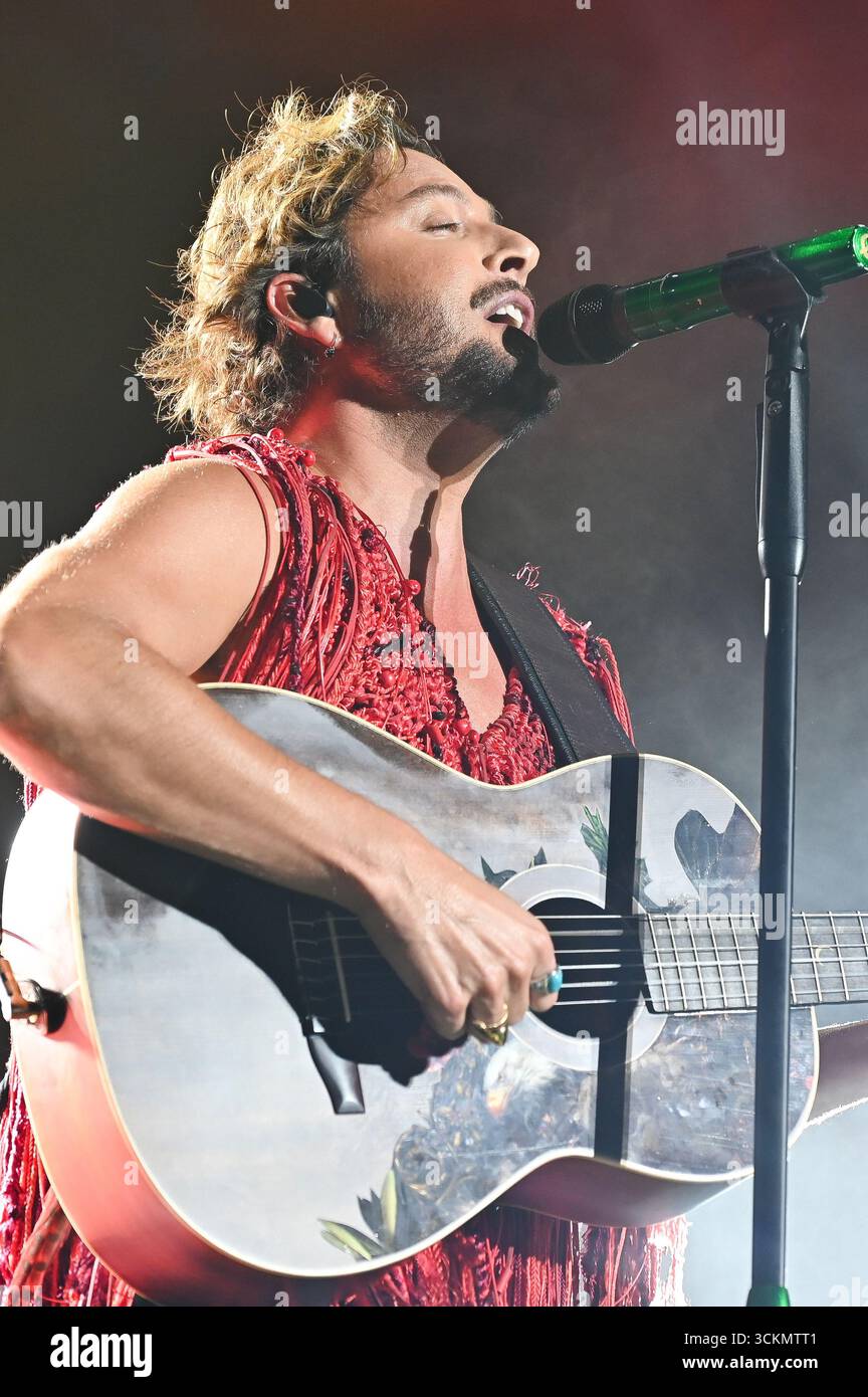 Spanish singer Manuel Carrasco, performs during the concert at Movistar ...