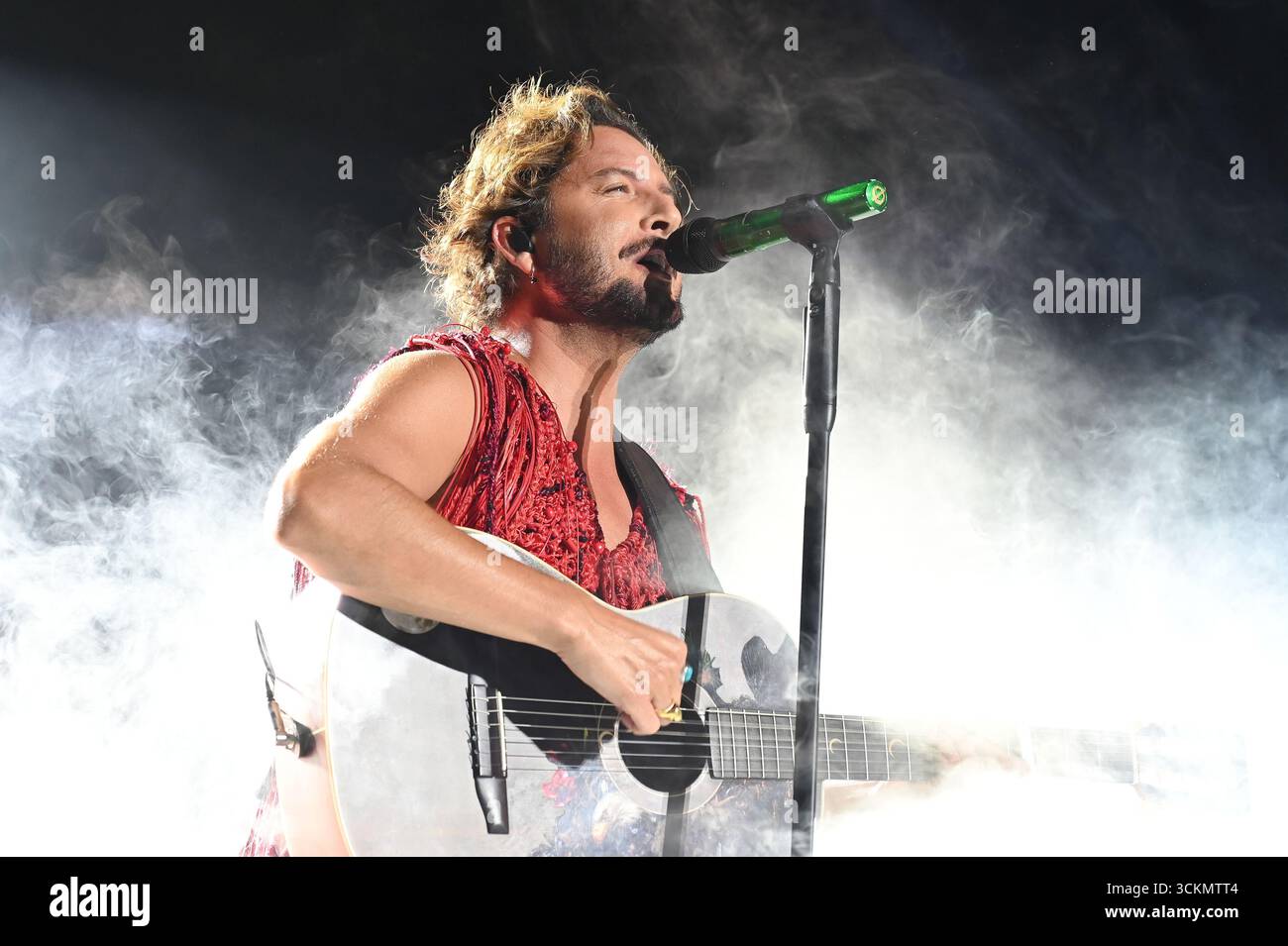 Spanish singer Manuel Carrasco, performs during the concert at Movistar ...
