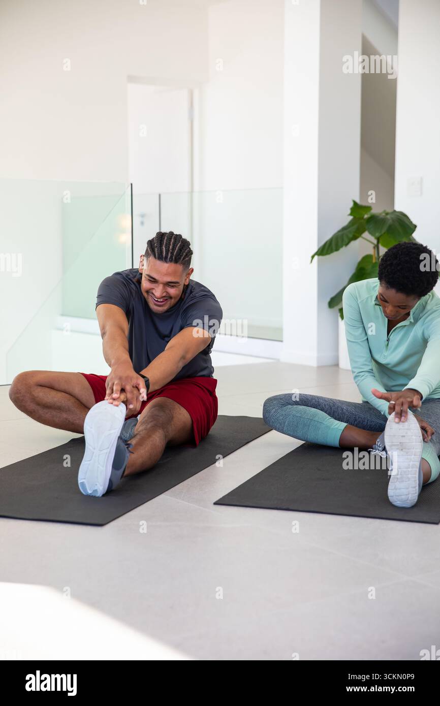 Woman training hamstrings on gym hi-res stock photography and images ...