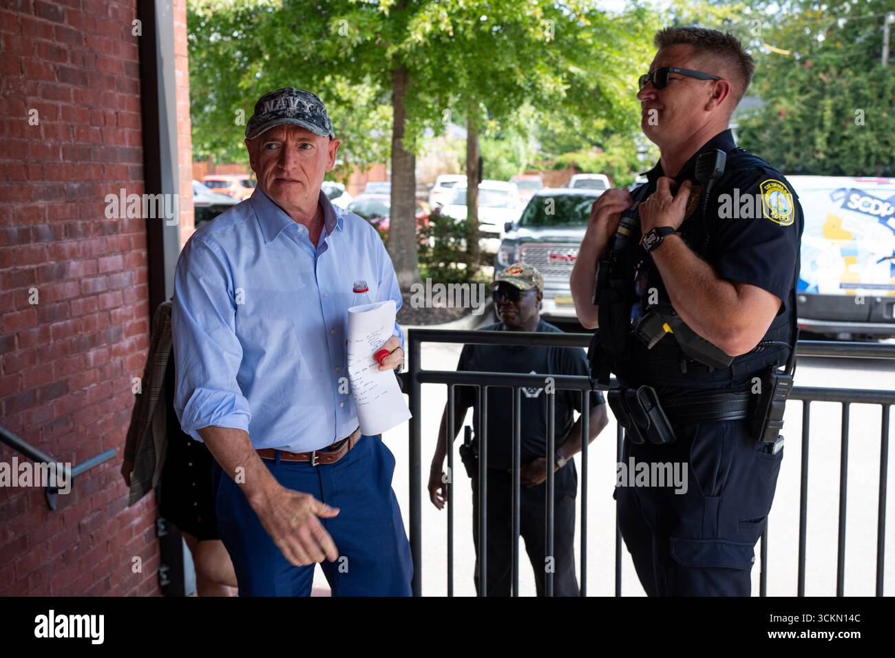 UNITED STATES - SEPTEMBER 12: Sen. Mark Kelly, D-Ariz., left, arrives ...