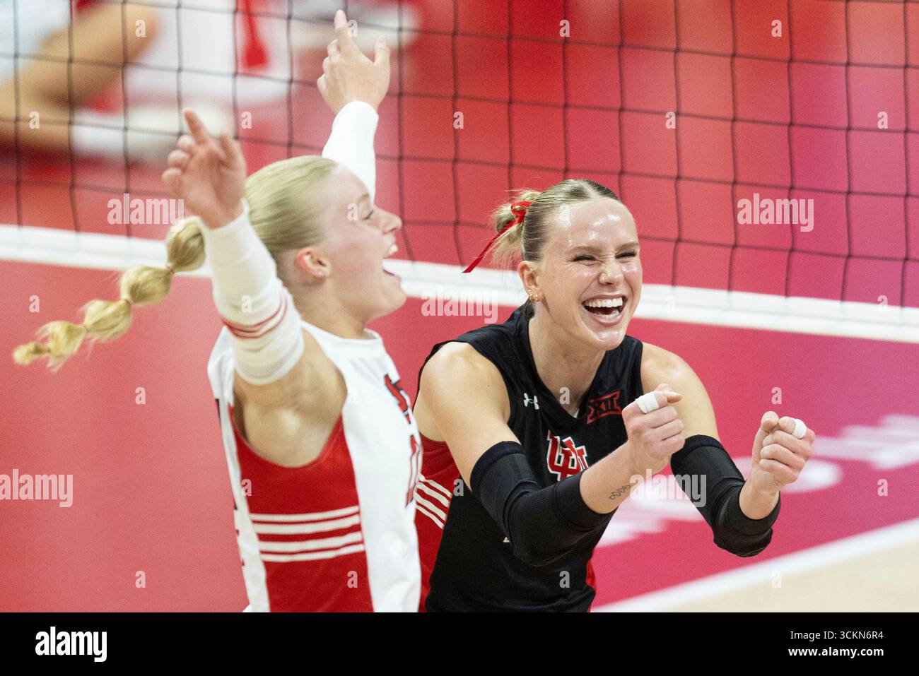 Utah's McKenna Payne, left, and Kamryn Gibadlo, right, celebrate during an NCAA college ...