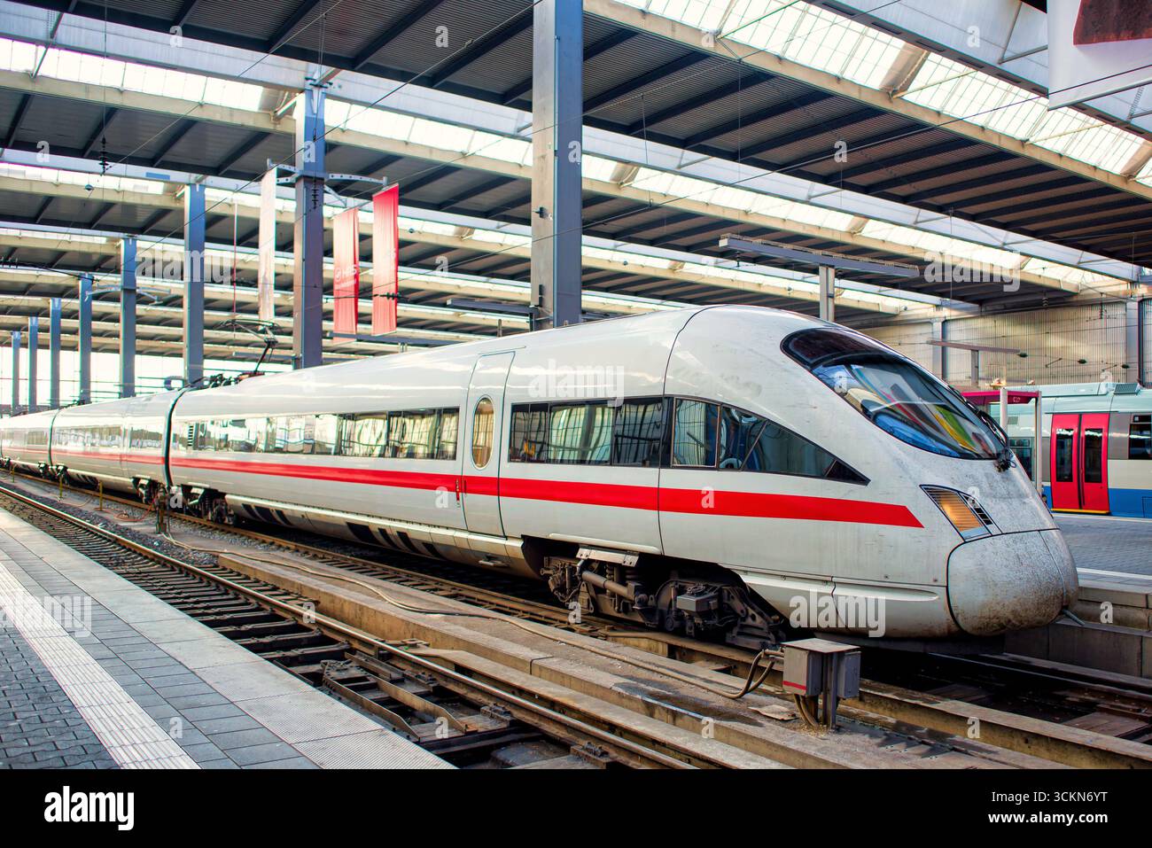 Inter City Express, white and red high speed modern train at railway ...