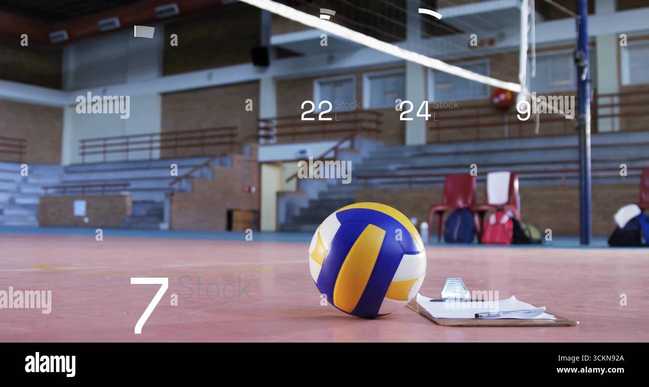 Lying volleyball beside clipboard and pen on gymnasium court, with net ...