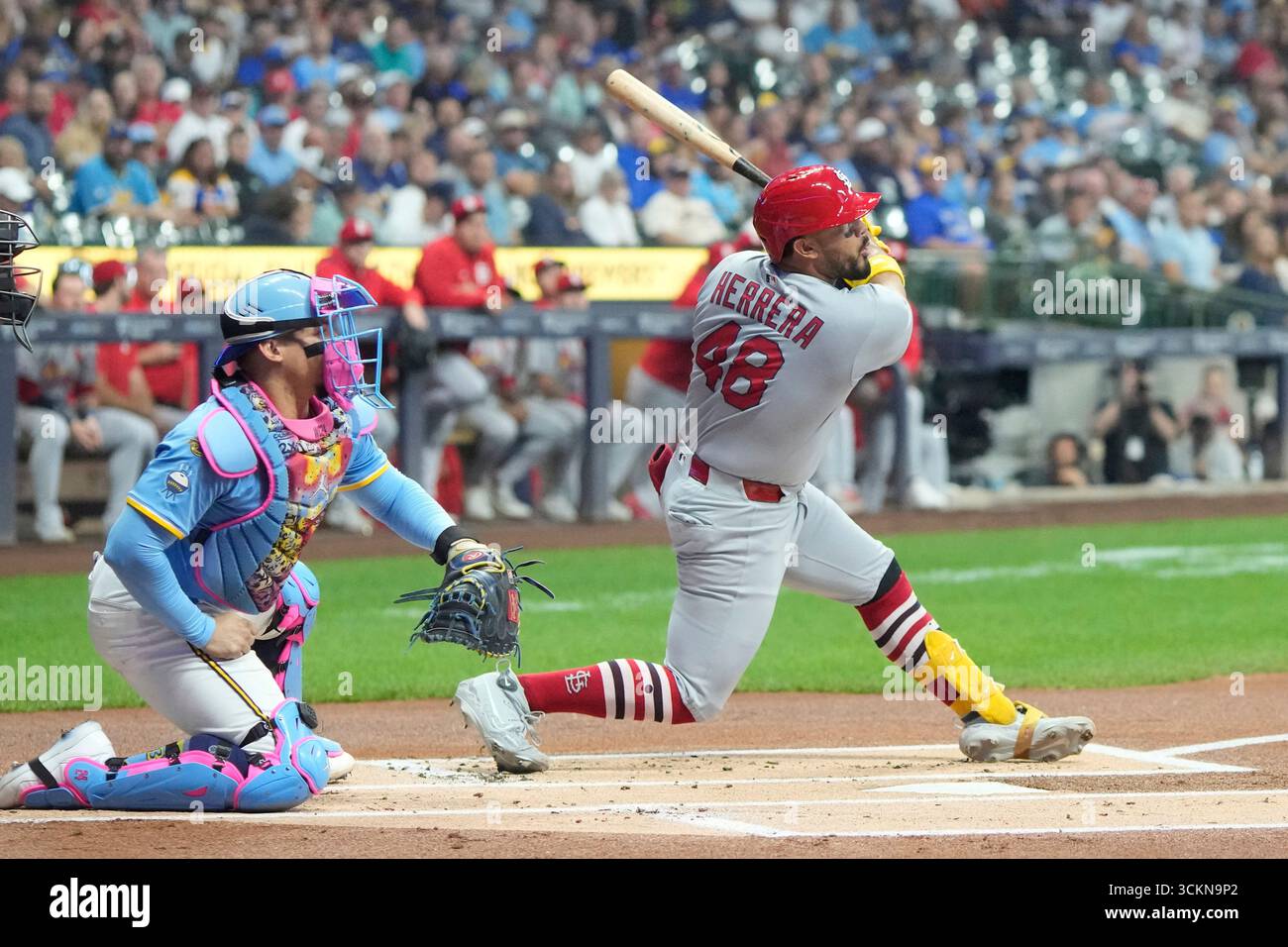 St. Louis Cardinals' Iván Herrera hits a single during the first inning ...