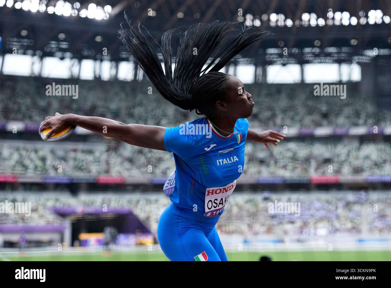 Italy's Daisy Osakue makes an attempt in the women's discus throw ...