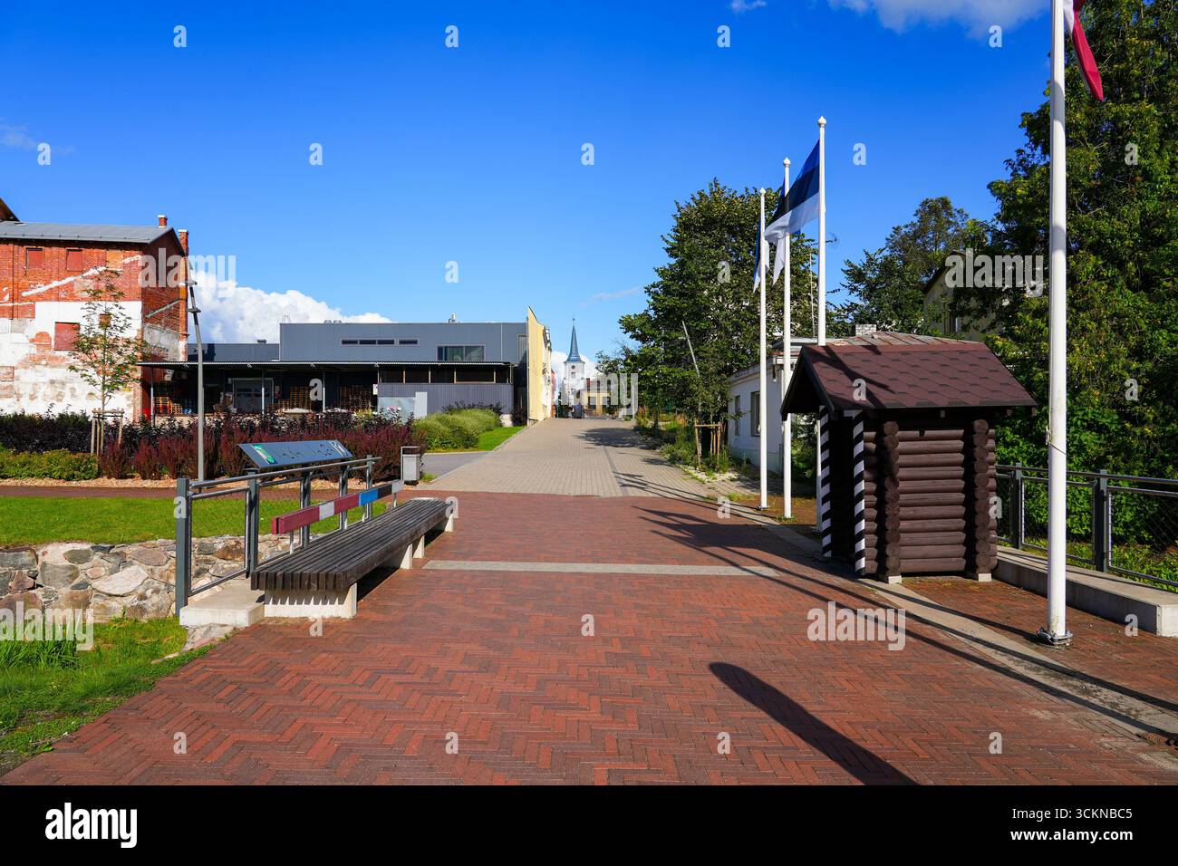 Traditional black and white wooden border guard house marking the open ...