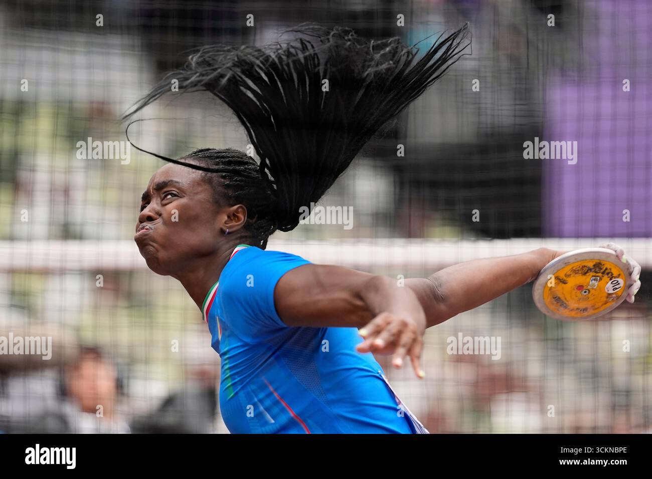 Italy's Daisy Osakue makes an attempt in the women's discus throw ...