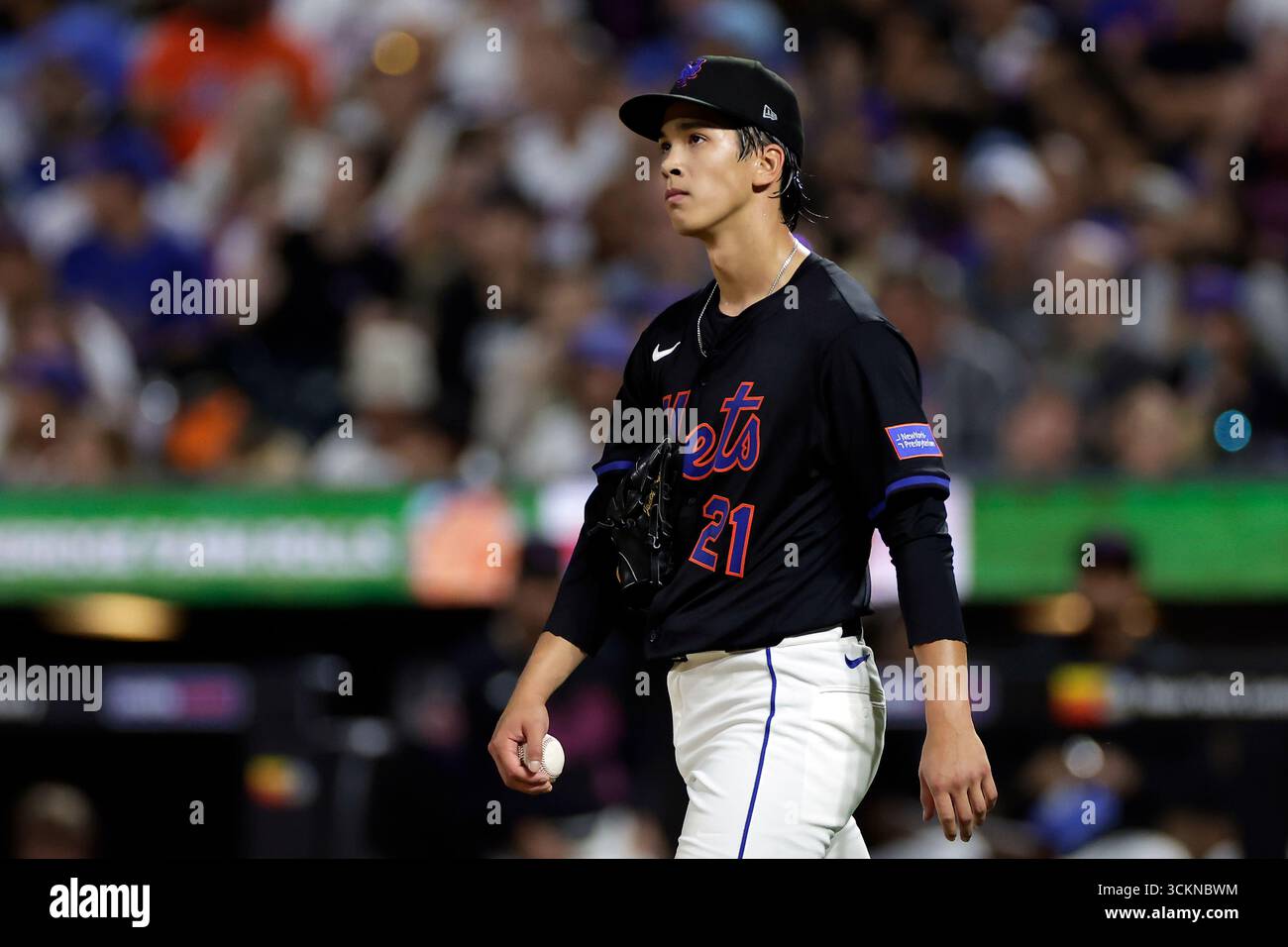 New York Mets pitcher Jonah Tong (21) reacts during the first inning of ...