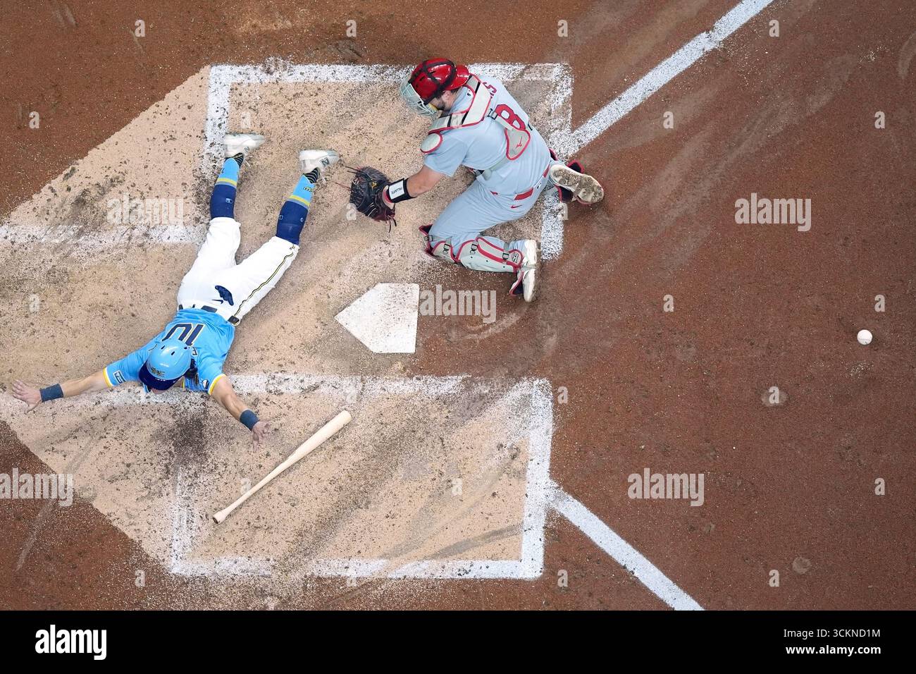 Milwaukee Brewers' Sal Frelick scores past St. Louis Cardinals catcher ...