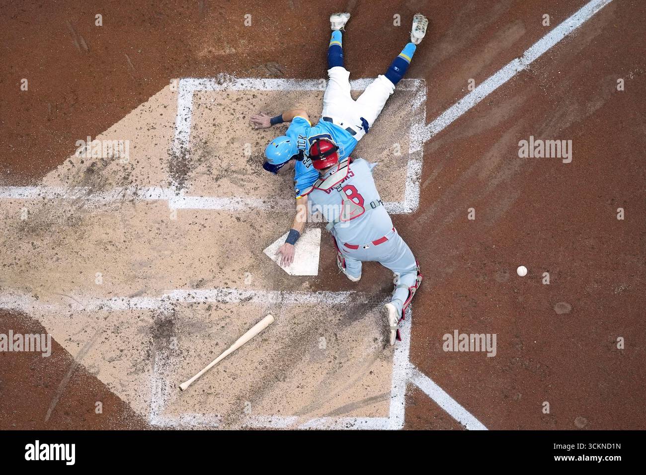 Milwaukee Brewers' Sal Frelick scores past St. Louis Cardinals catcher ...
