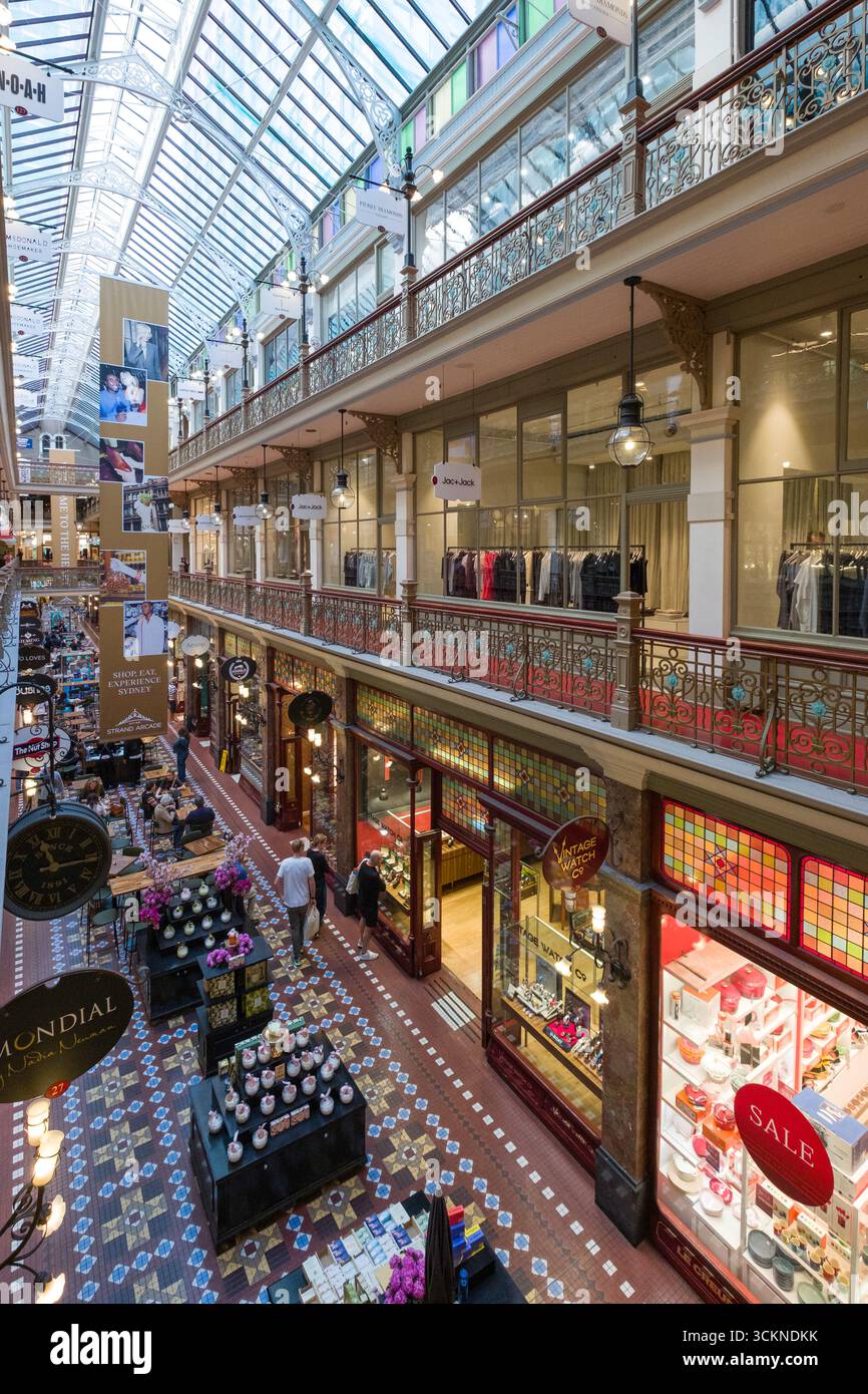 View of a sophisticated shopping arcade featuring boutique shops, a ...