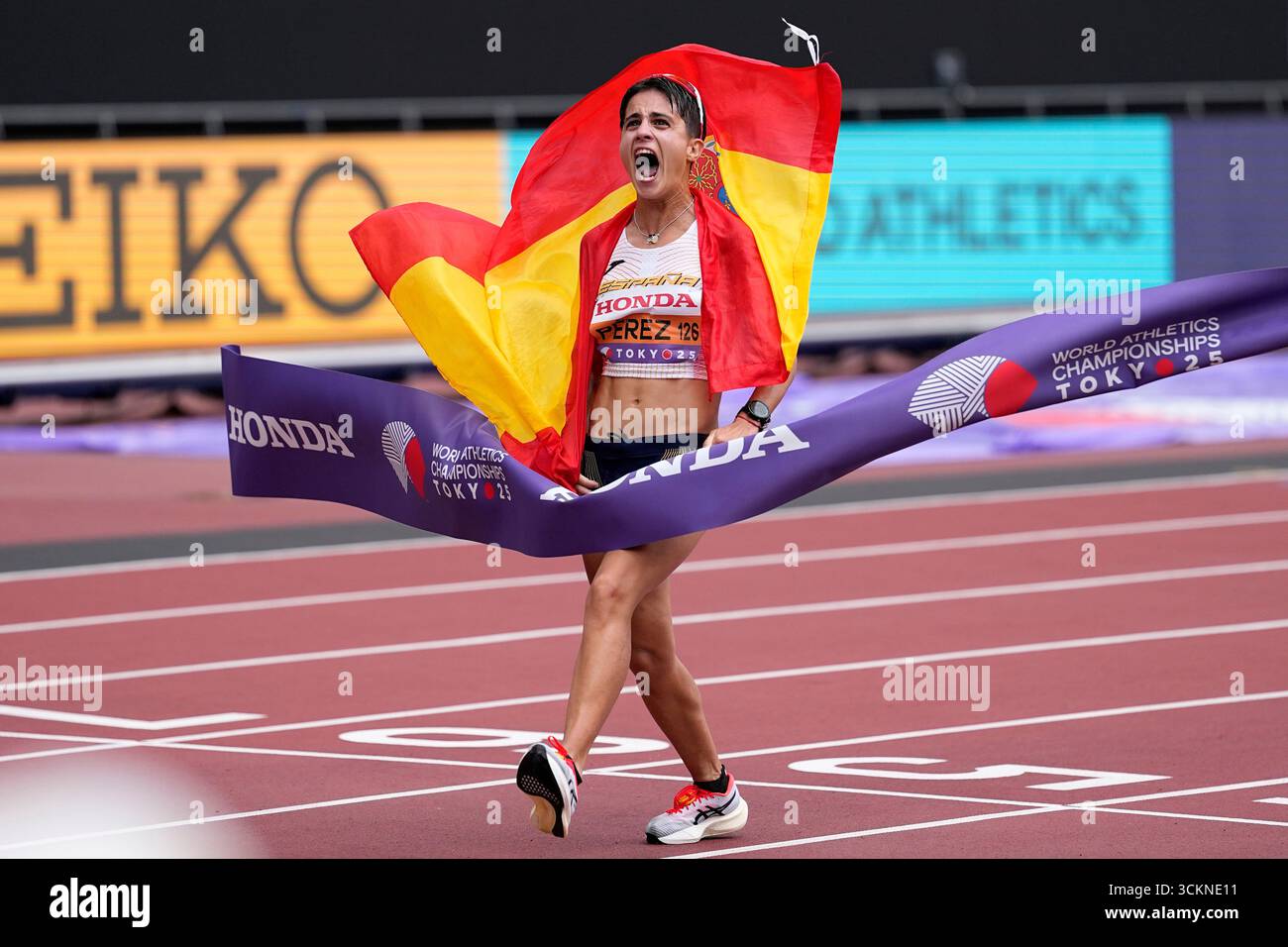 Spain's Maria Perez crosses the finish line to win the women's 35 ...