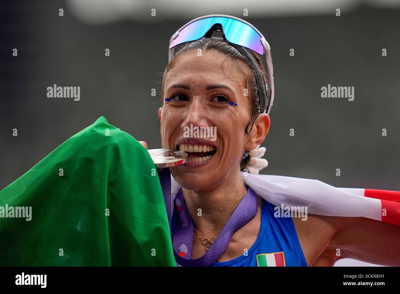 Italy's Antonella Palmisano celebrates with her silver medal after the ...