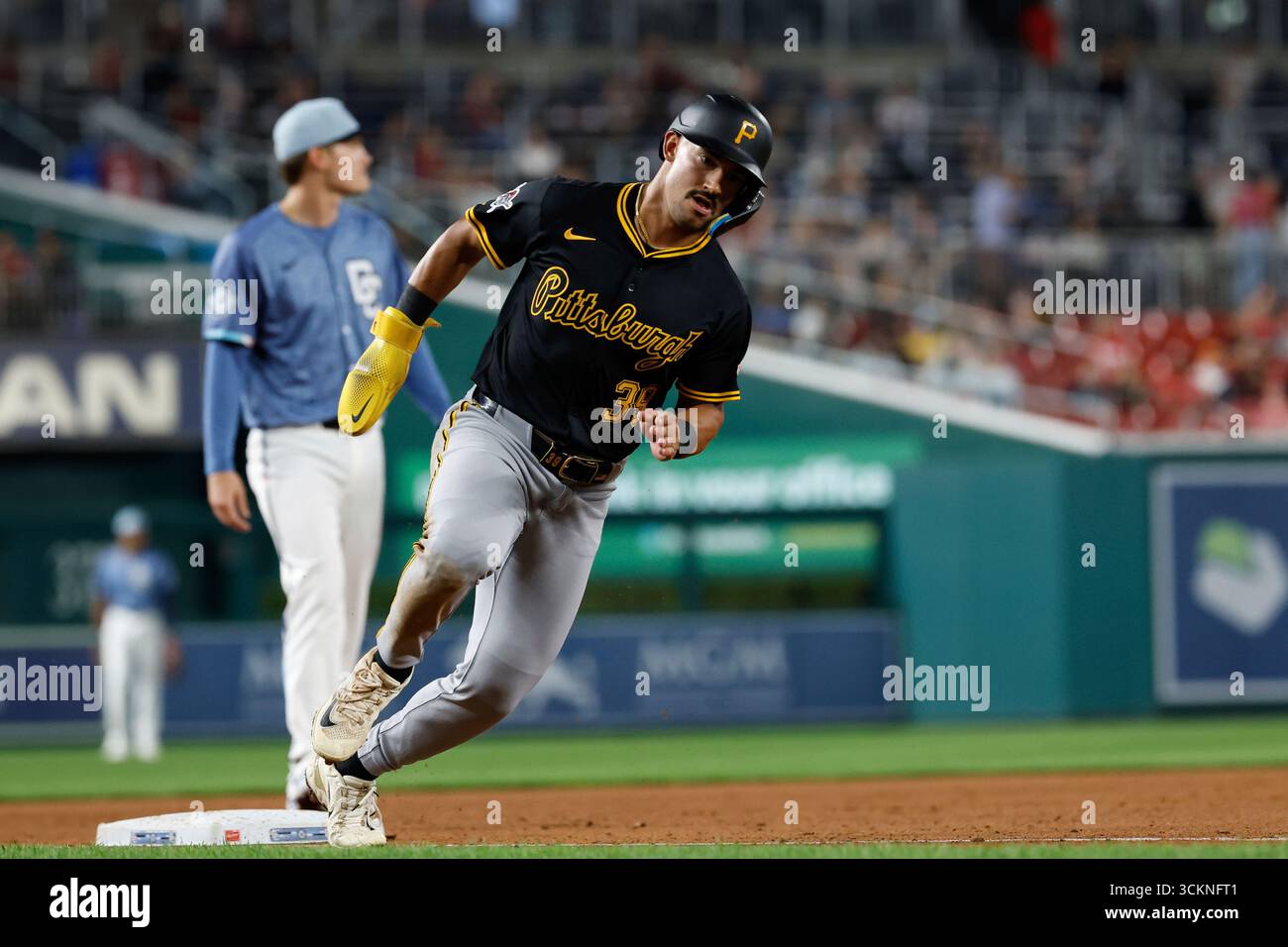 Pittsburgh Pirates' Nick Gonzales scores a run on a single hit by Nick ...