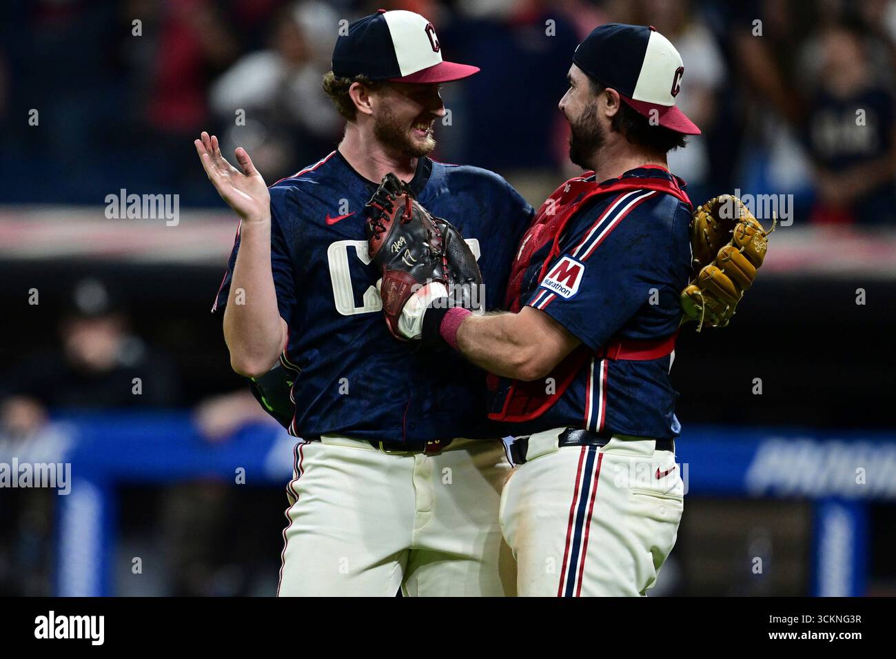 Cleveland Guardians starting pitcher Tanner Bibee, left, is ...