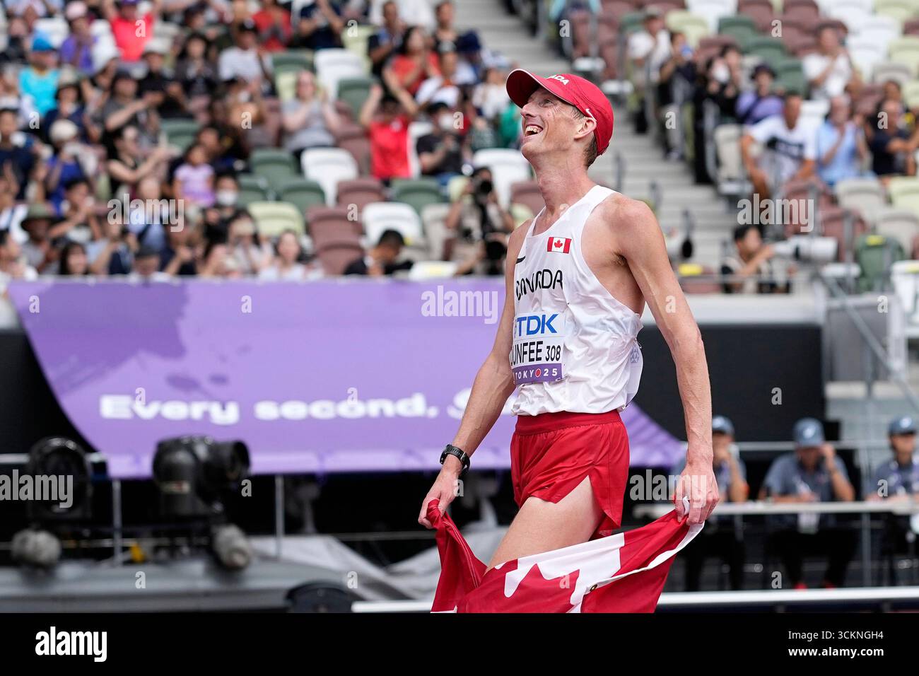 Canada's Evan Dunfee reacts after crossing the finish line to win the ...