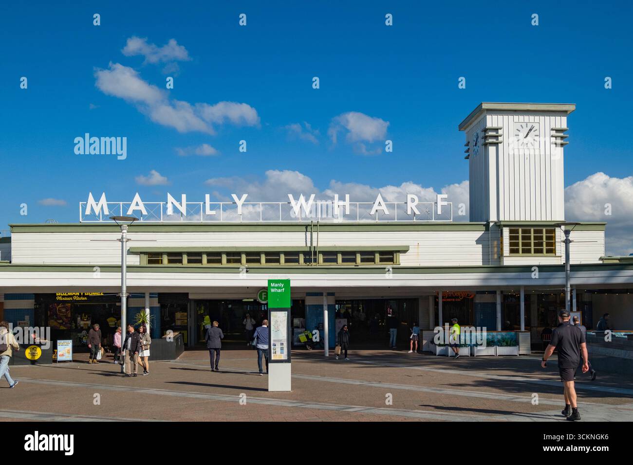 Manly Wharf's iconic facade on a sunny day, featuring the clock tower ...