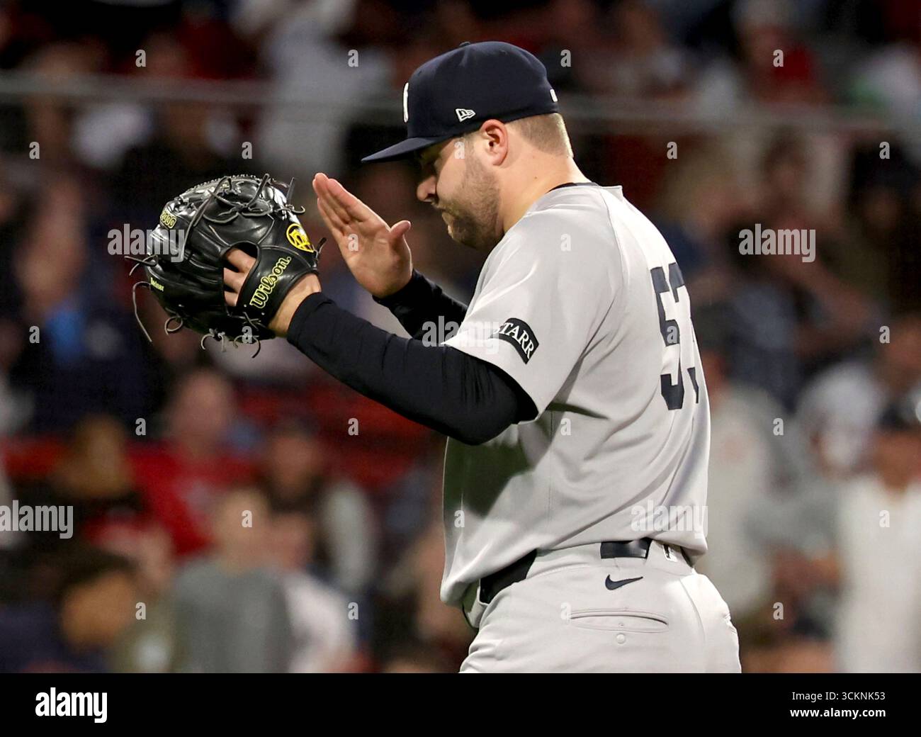New York Yankees pitcher David Bednar reacts after striking out the ...