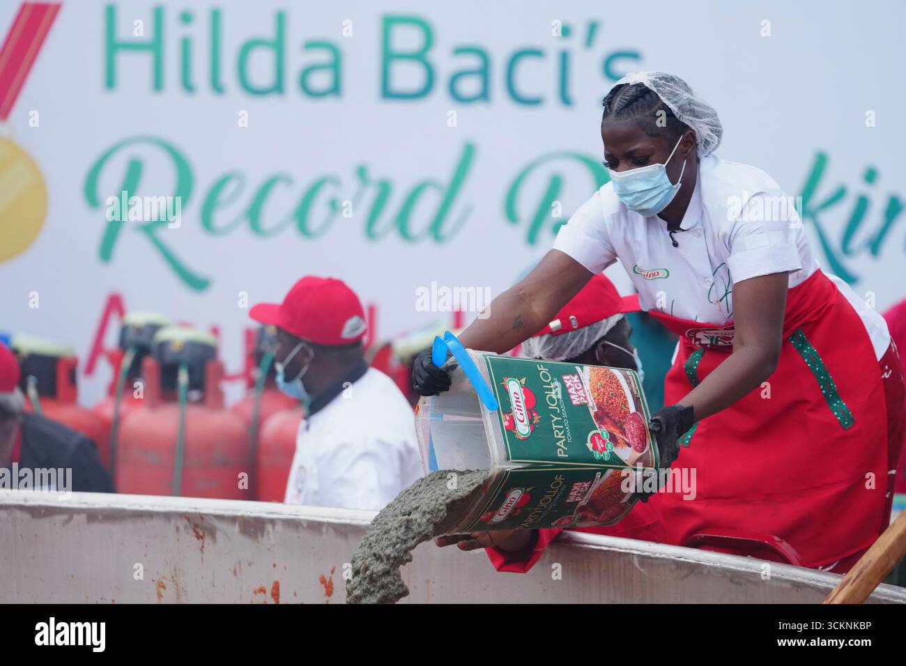 Chef Hilda Baci attempts to cook the world's largest pot of Jollof Rice ...
