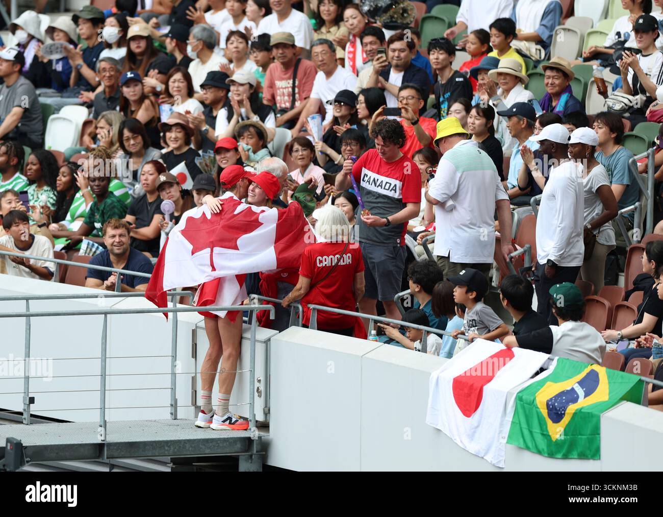 Evan DUNFEE of Canada celebrates after winning the Men's 35 Kilometres ...