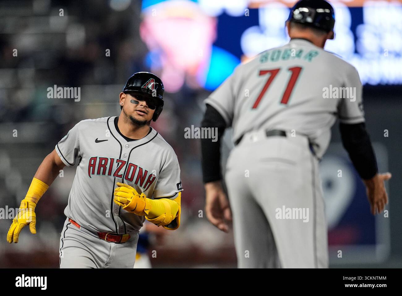 Arizona Diamondbacks' Gabriel Moreno (14) runs around third base after ...