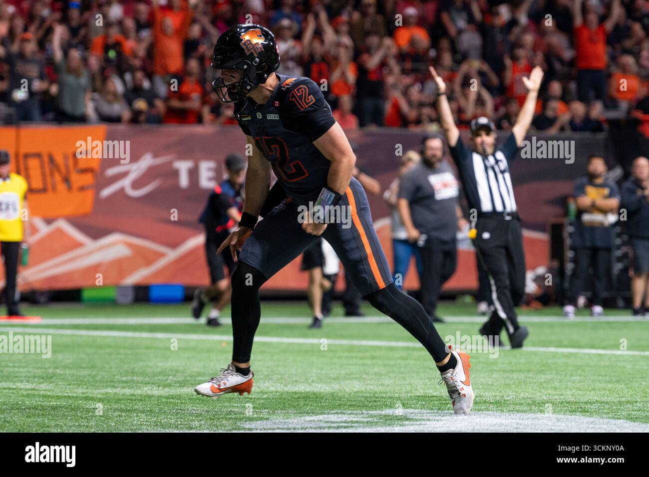 B.C. Lions quarterback Nathan Rourke (12) celebrates his touchdown run ...